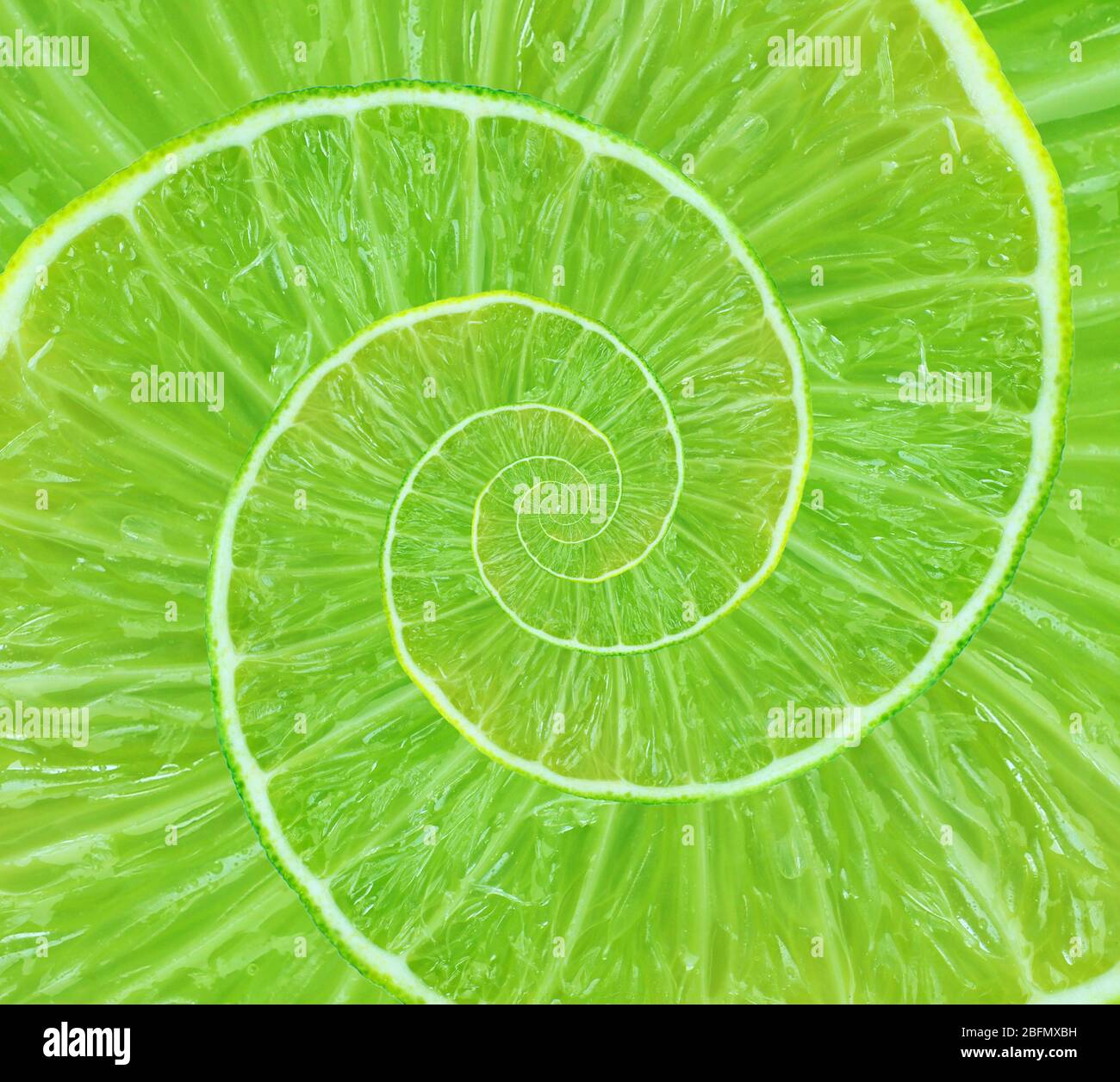 Spiral background made of juicy lime Stock Photo - Alamy