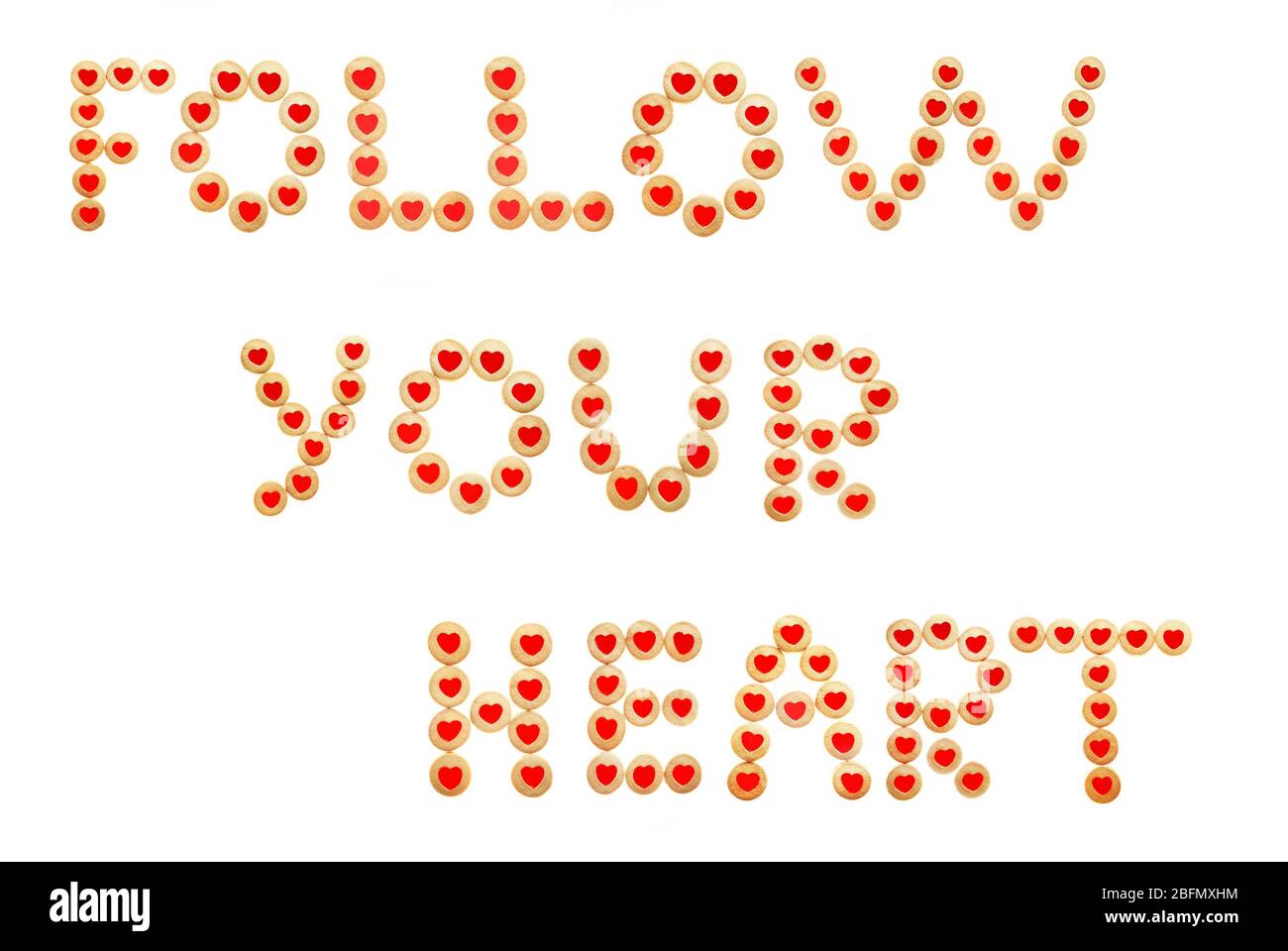 Cookies inscription Follow your heart, isolated on white Stock Photo ...