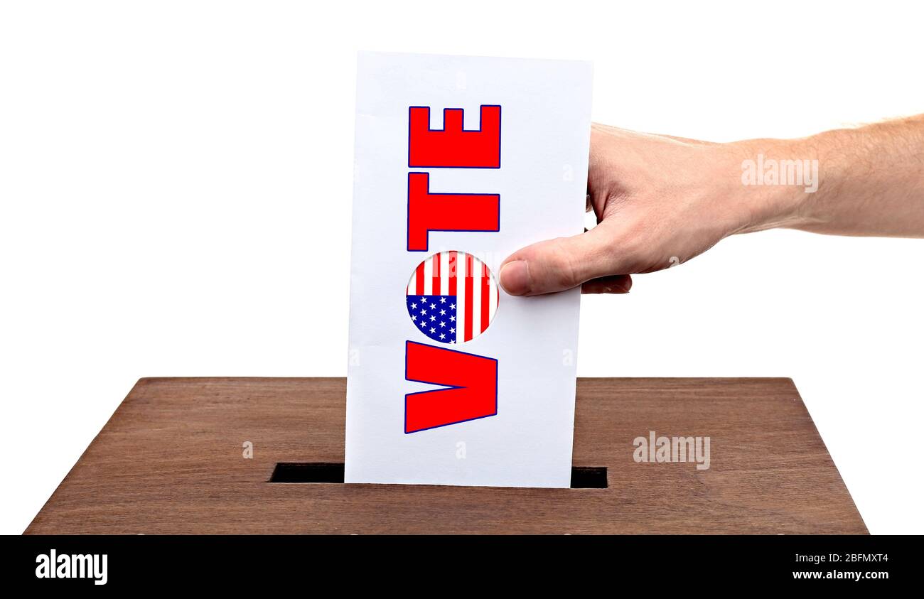 Human hand inserting bulletin in ballot box isolated on white Stock ...