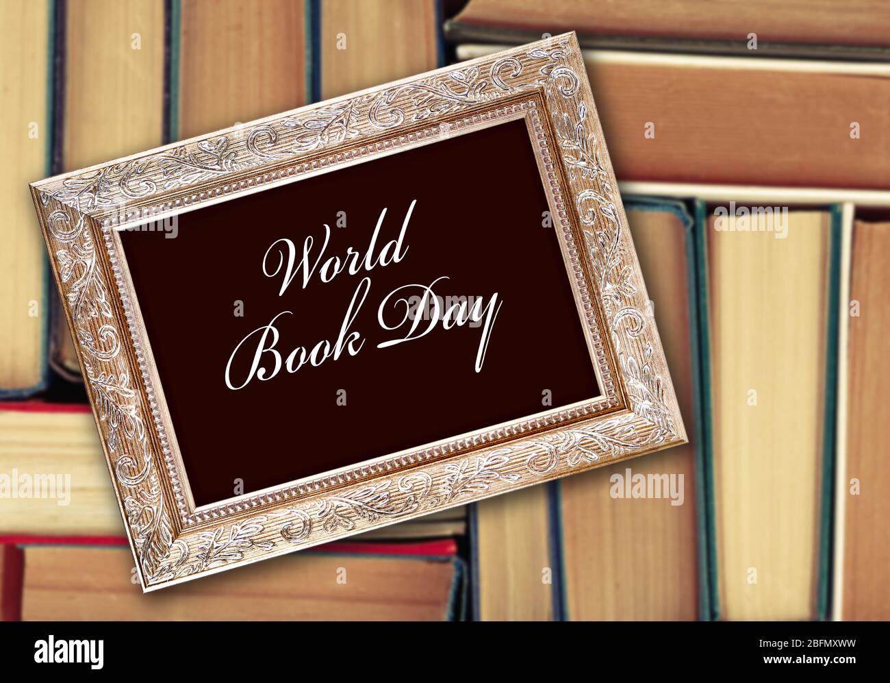 World Book Day concept. Text in frame on blurred books background Stock ...