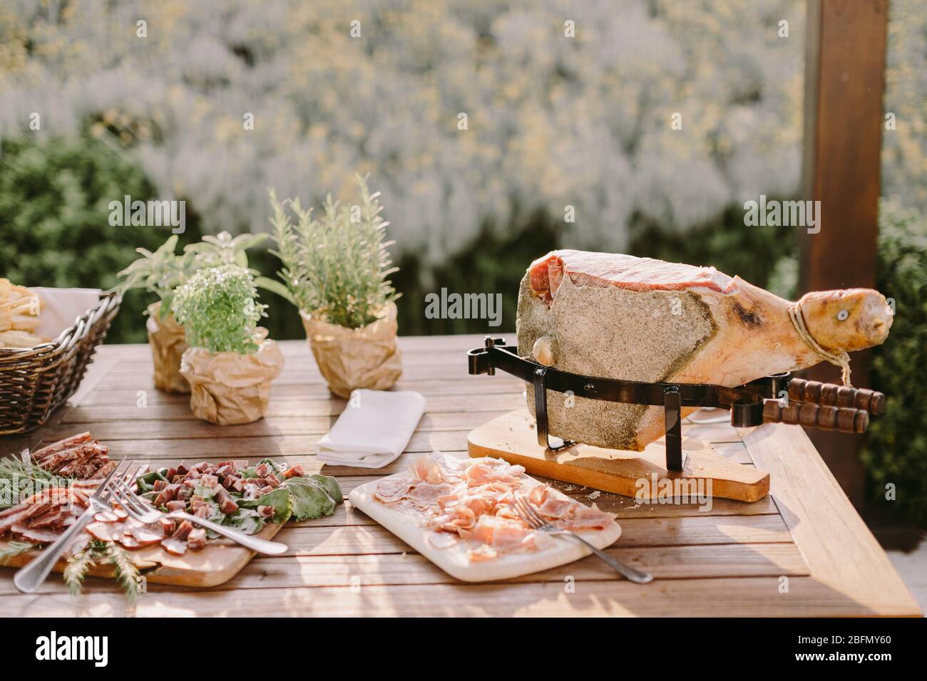 prosciutto leg and ham in italy. whole leg prosciutto slicing. Catering ...