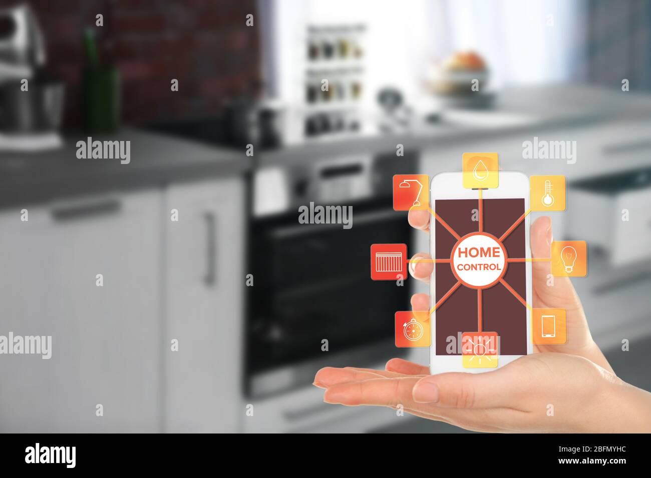 Using smart home app on phone. Smart home control concept Stock Photo ...