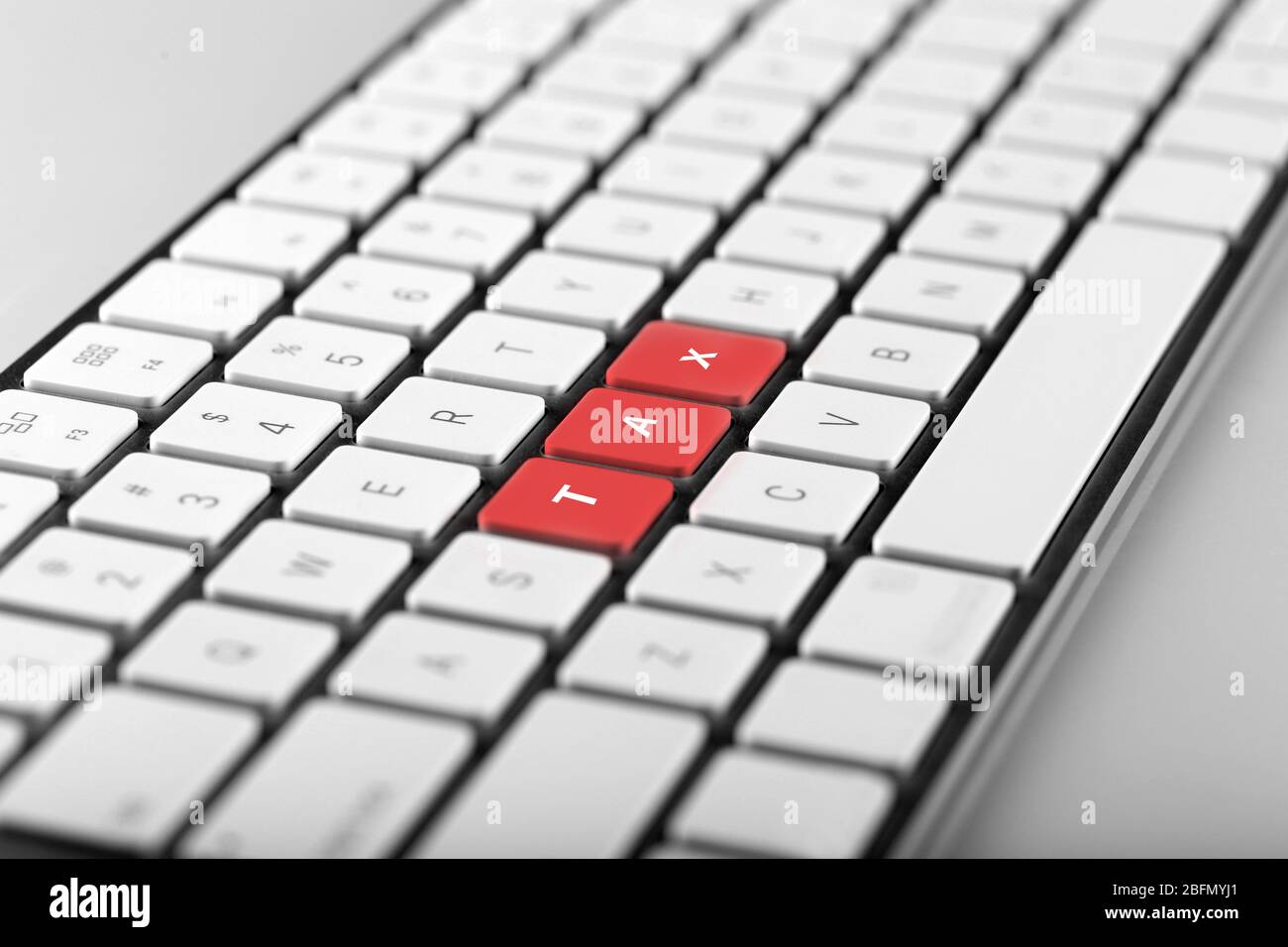 Tax Concept. White keys of computer keyboard, closeup Stock Photo - Alamy