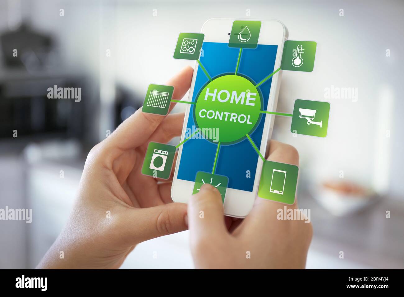 Using smart home app on phone. Smart home control concept Stock Photo ...