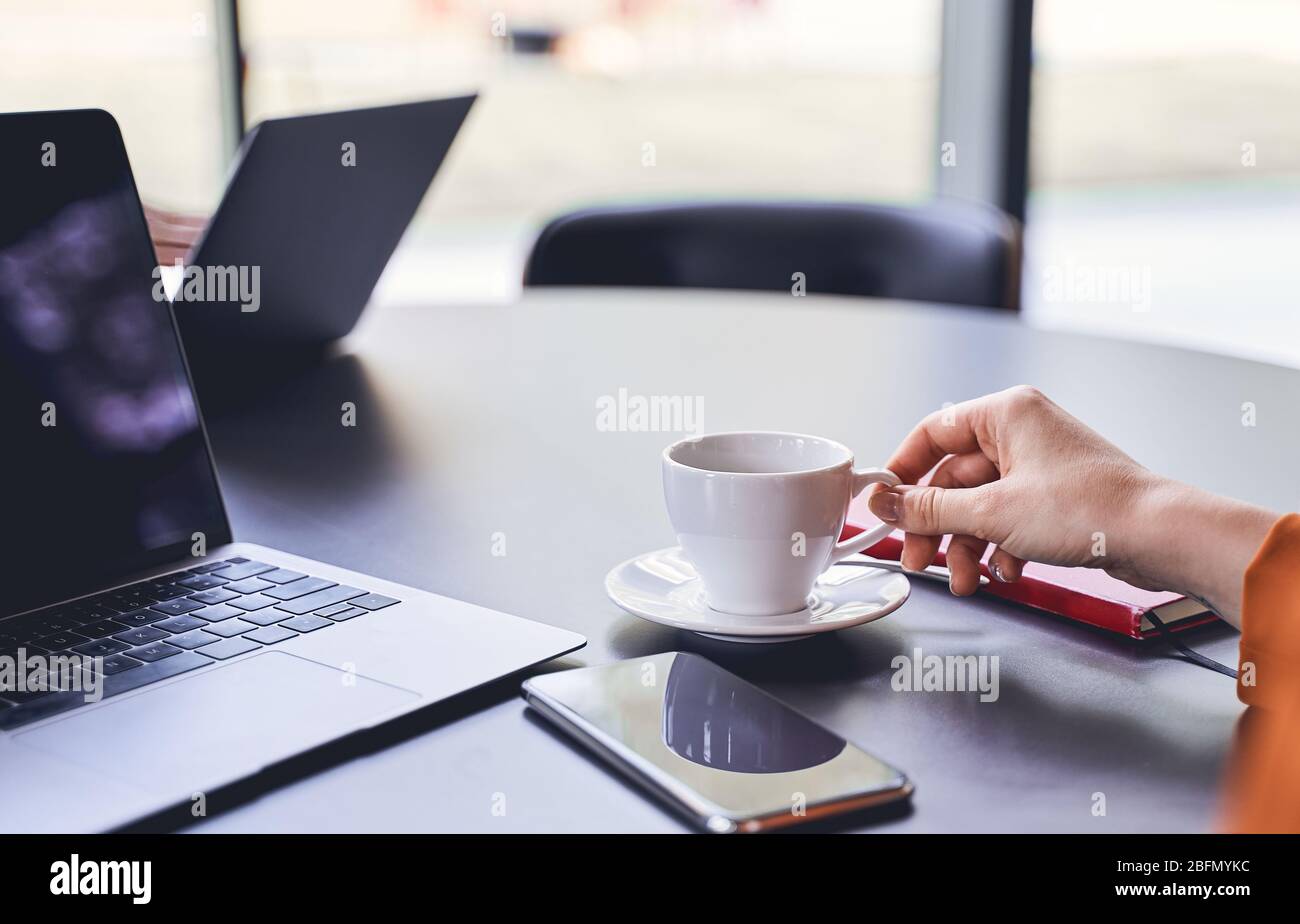 Lifting the cup hi-res stock photography and images - Alamy