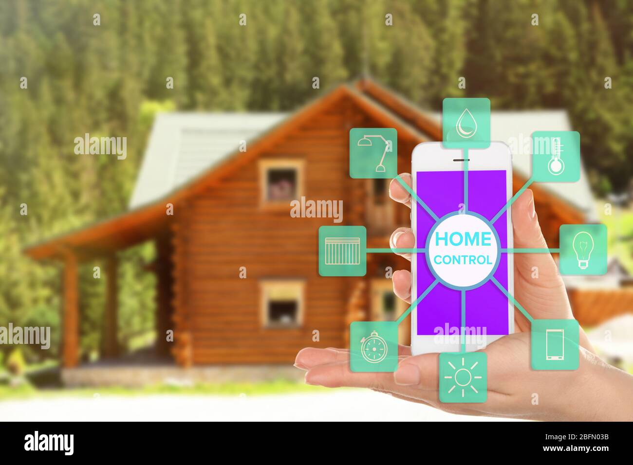 Using smart home app on phone. Smart home control concept Stock Photo ...