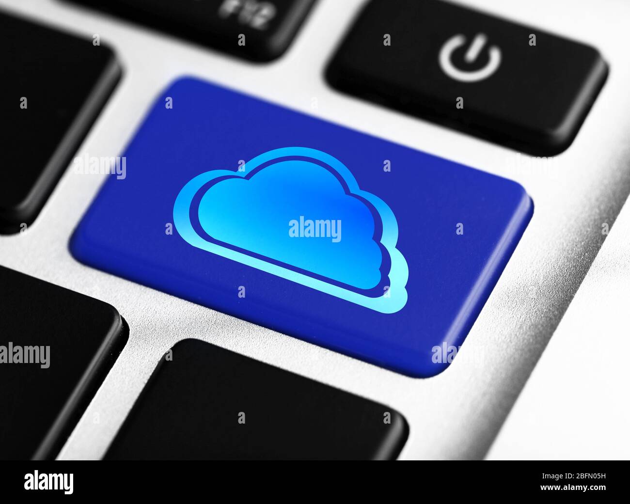 Cloud on computer keyboard. Cloud storage concept Stock Photo - Alamy