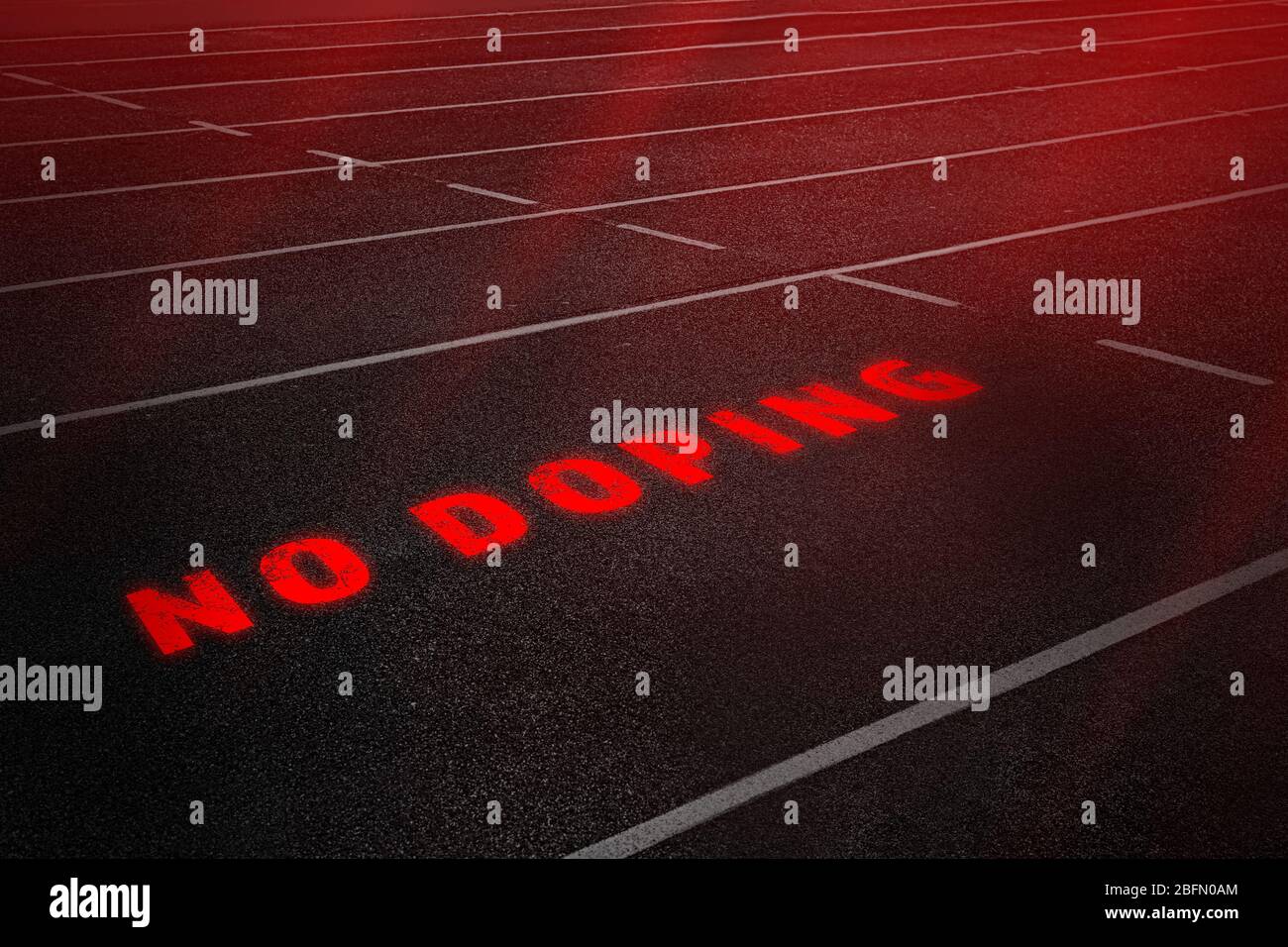 Stop doping concept. Text on running track Stock Photo - Alamy