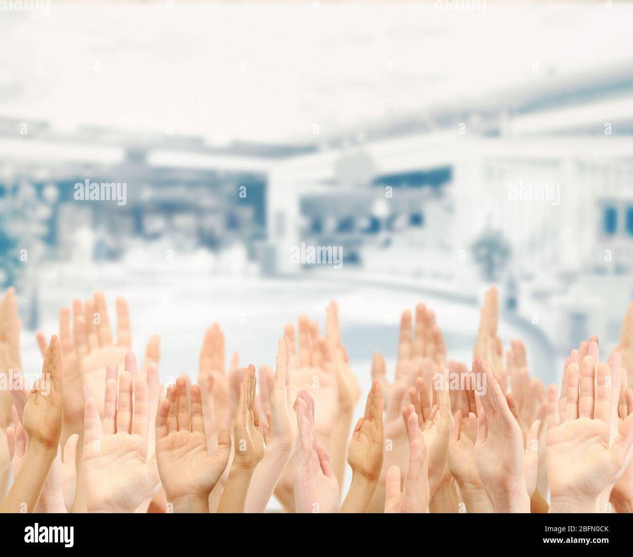 Crowd raising hands, close up Stock Photo - Alamy