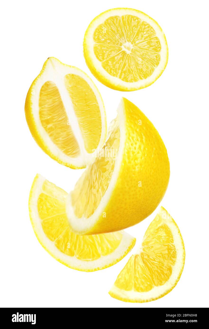 Sliced ripe lemon falling on hi-res stock photography and images - Alamy