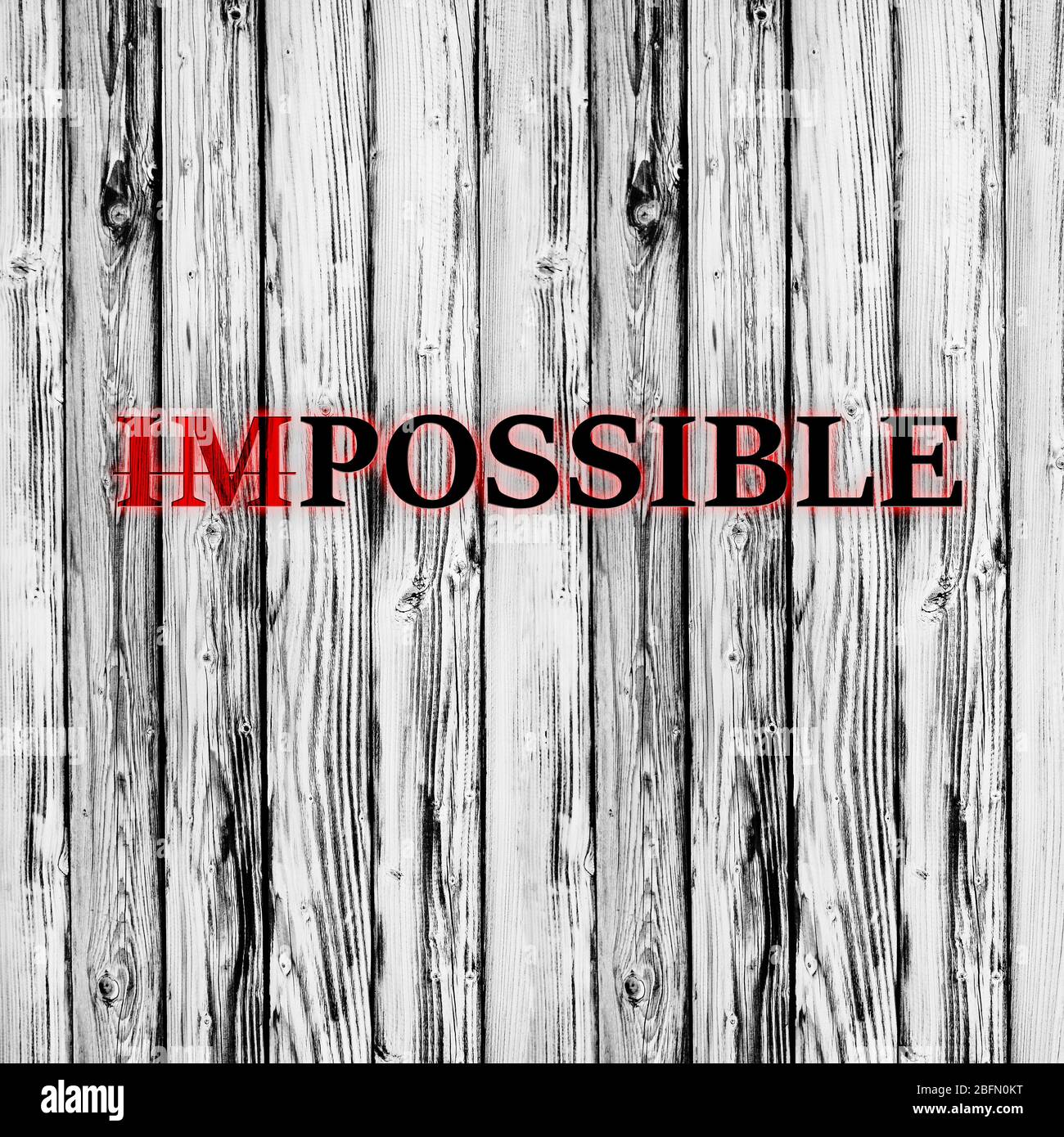 Word impossible transformed into possible on grey wall Stock Photo - Alamy
