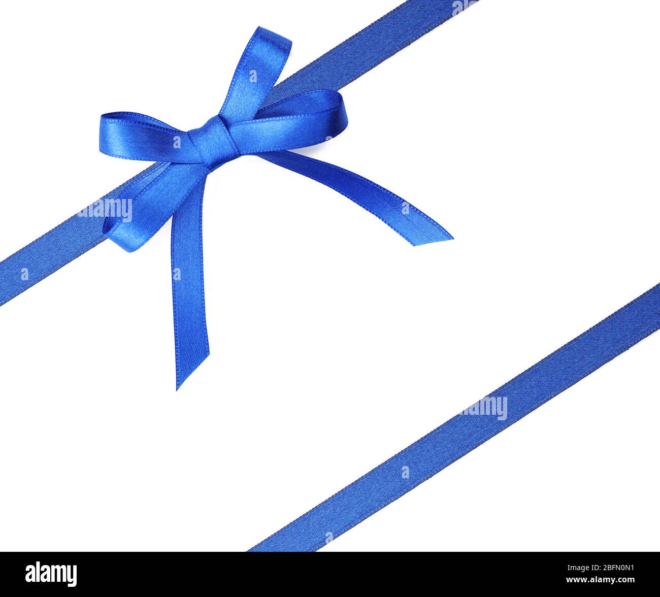 Blue diagonal ribbons and bow, isolated on white Stock Photo - Alamy