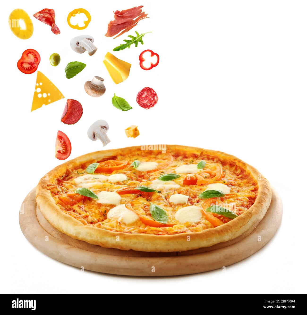 Fried pizza with falling ingredients isolated on white Stock Photo - Alamy