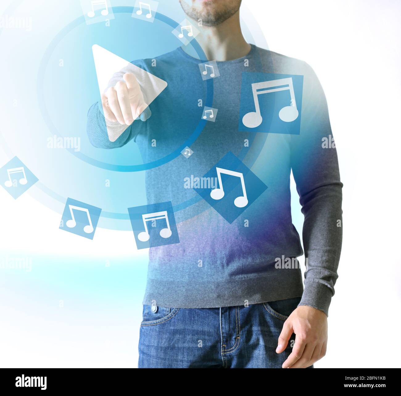 Man push play button on touch screen Stock Photo - Alamy