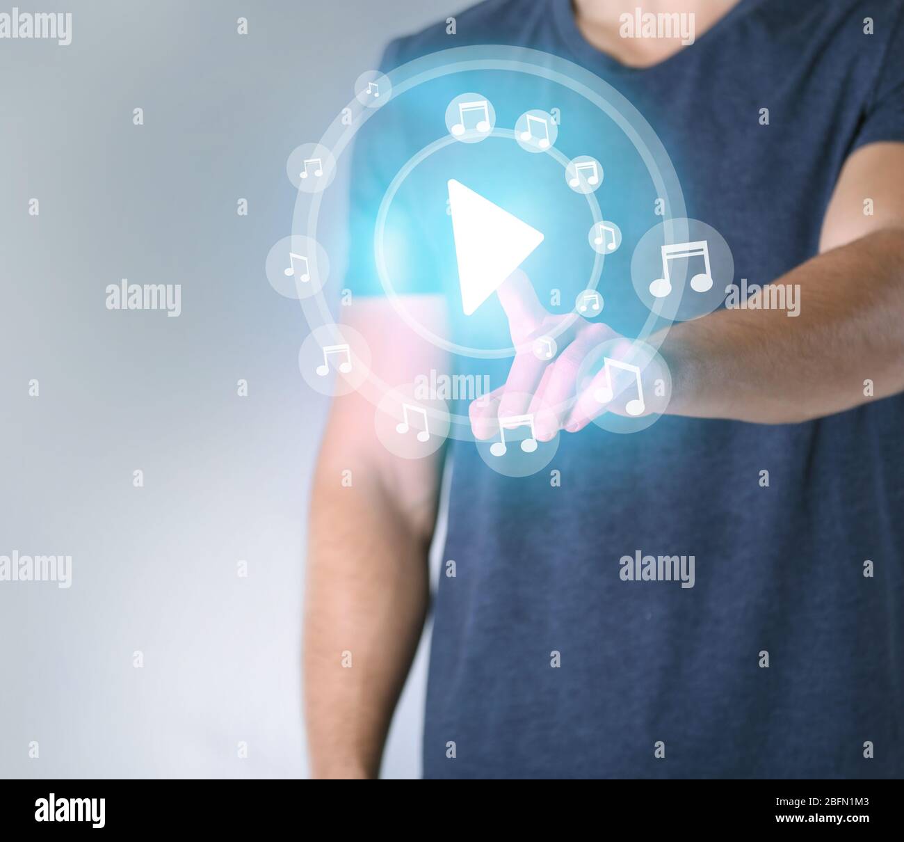 Man push play button on high tech touch screen Stock Photo - Alamy