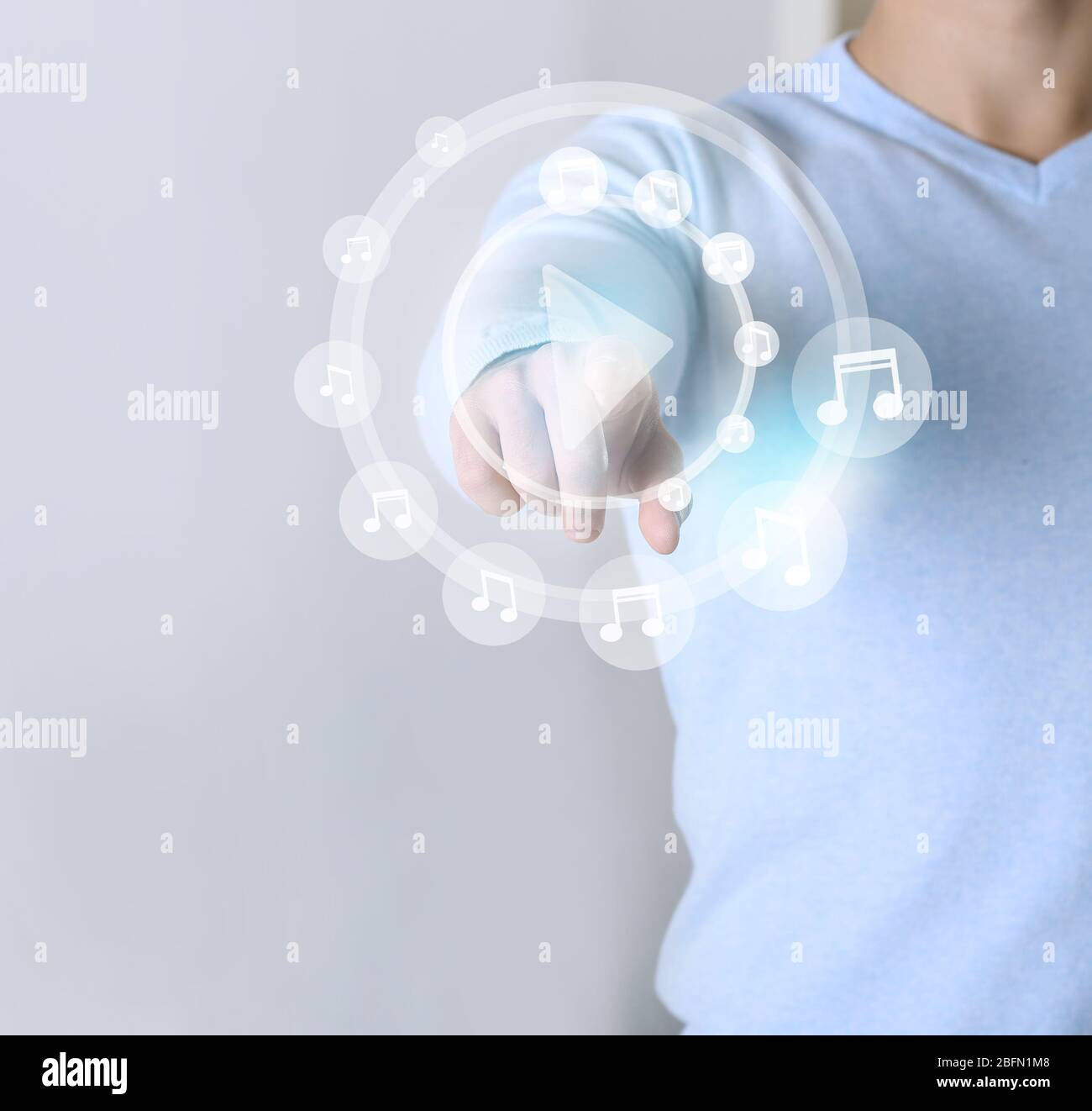 Man push play button on high tech touch screen Stock Photo - Alamy