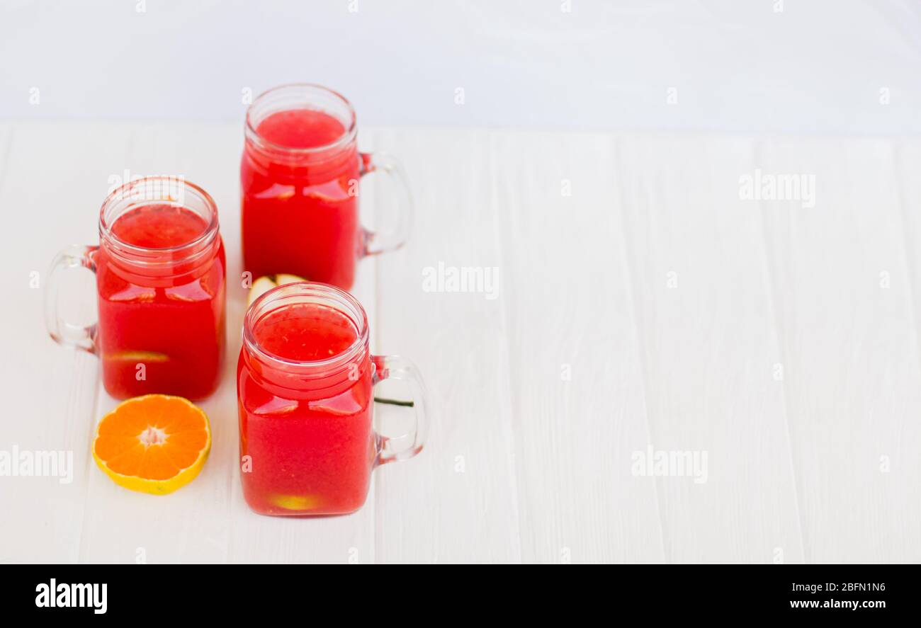 Refreshing homemade lemonade from watermelon and lemon in glass cups on ...