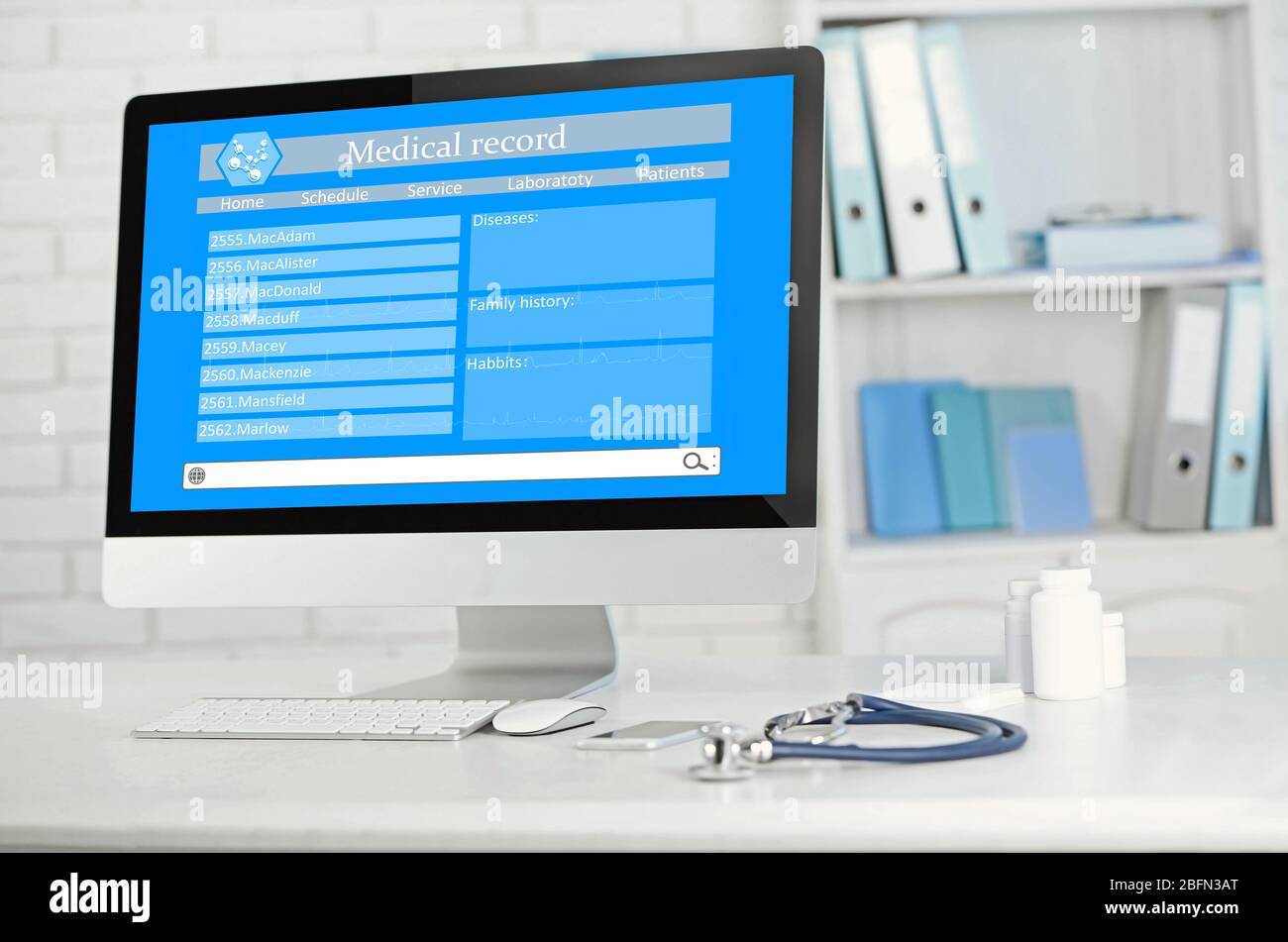 Medical record form on computer in doctor office Stock Photo - Alamy
