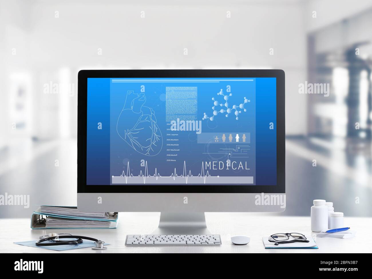 Medical interface on computer in doctor office Stock Photo - Alamy