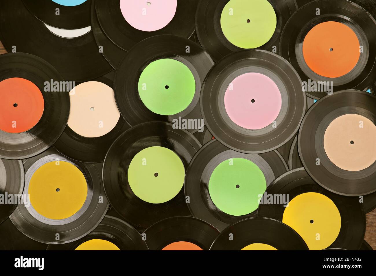 Vinyl records with multicolored labels, background Stock Photo - Alamy