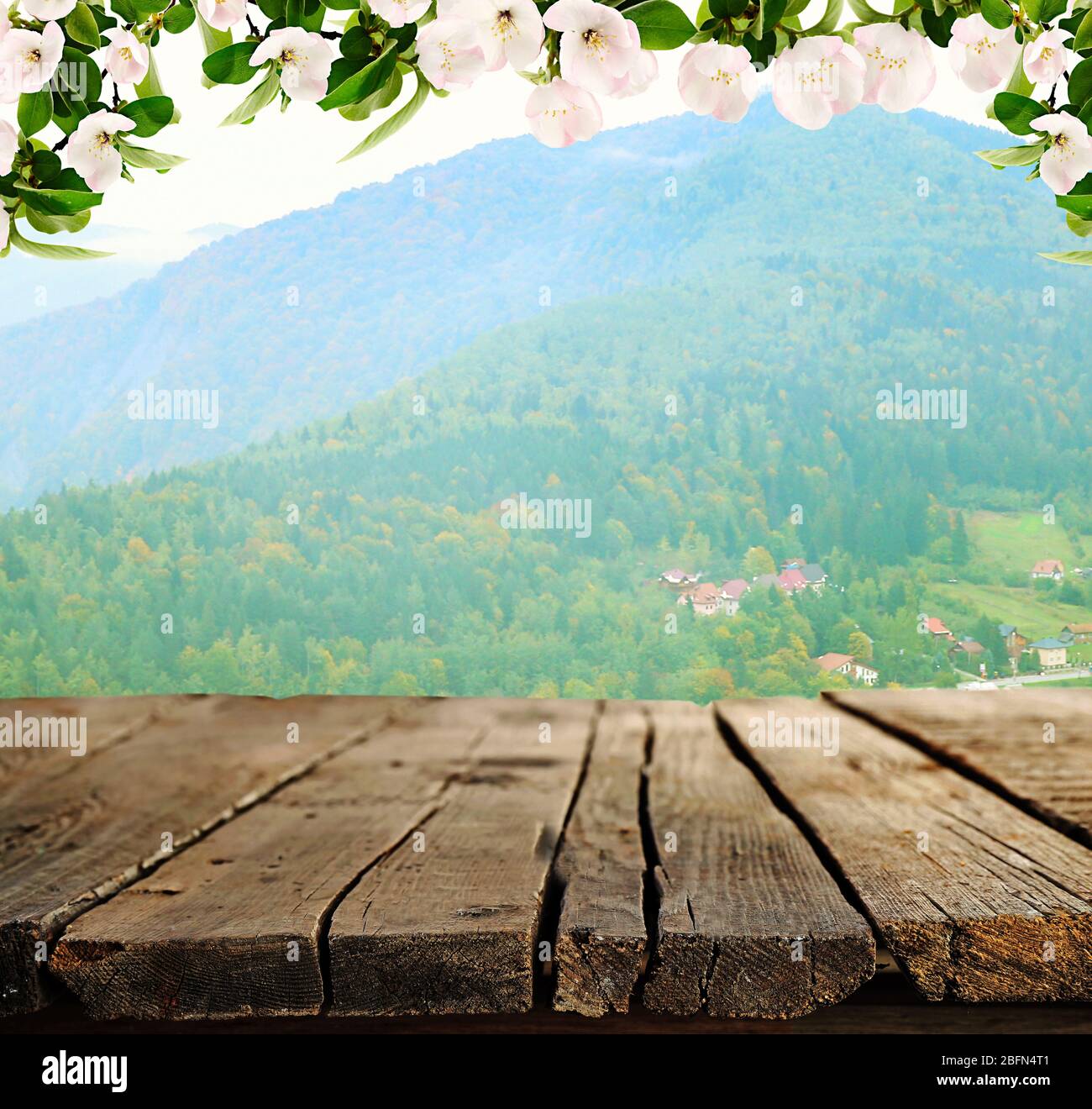 Nature landscape. Wooden terrace with mountains and blooming trees ...