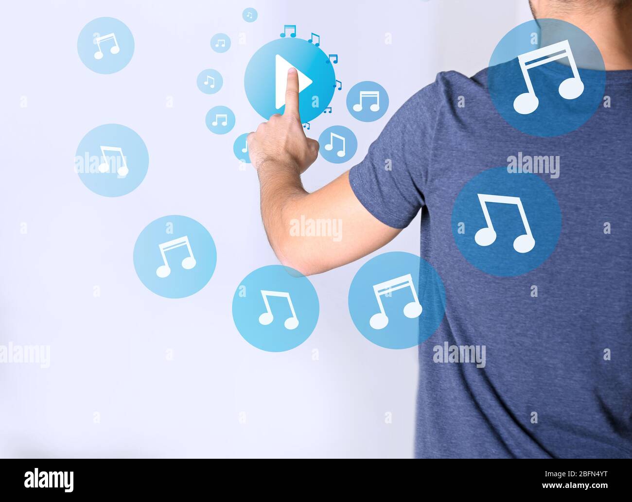 Man push play button on high tech touch screen Stock Photo - Alamy