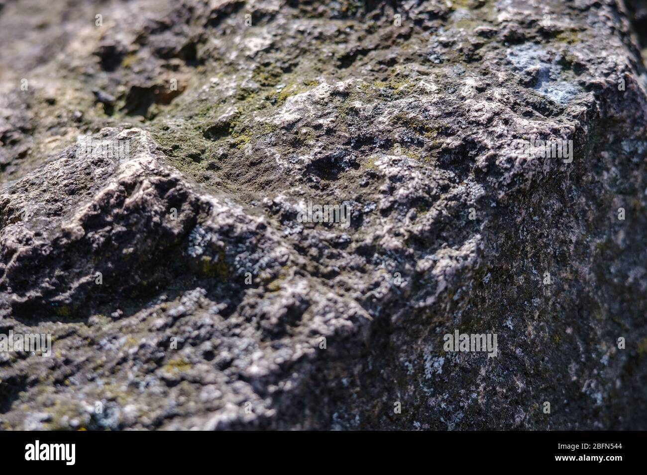 Moss on the old stone surface. Natural stone surface texture background ...