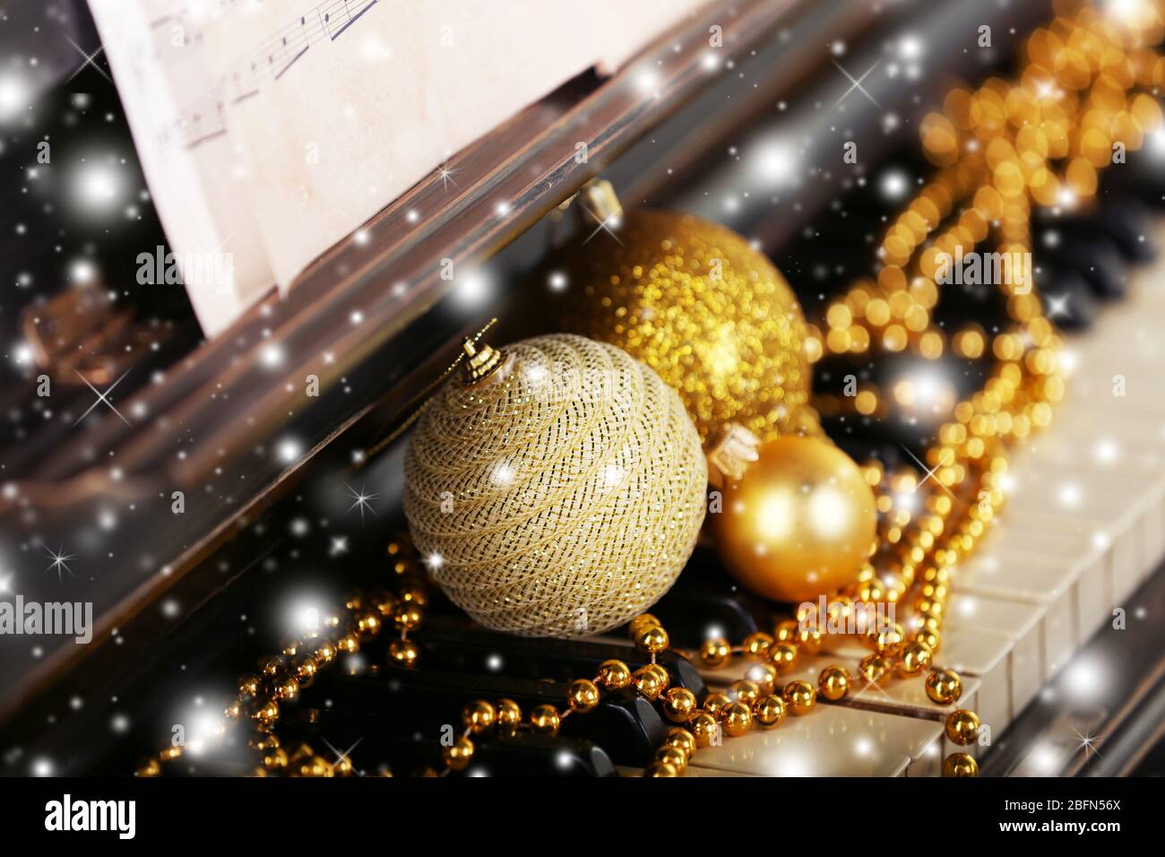 Piano keys decorated and Christmas decorations with snow effect Stock ...