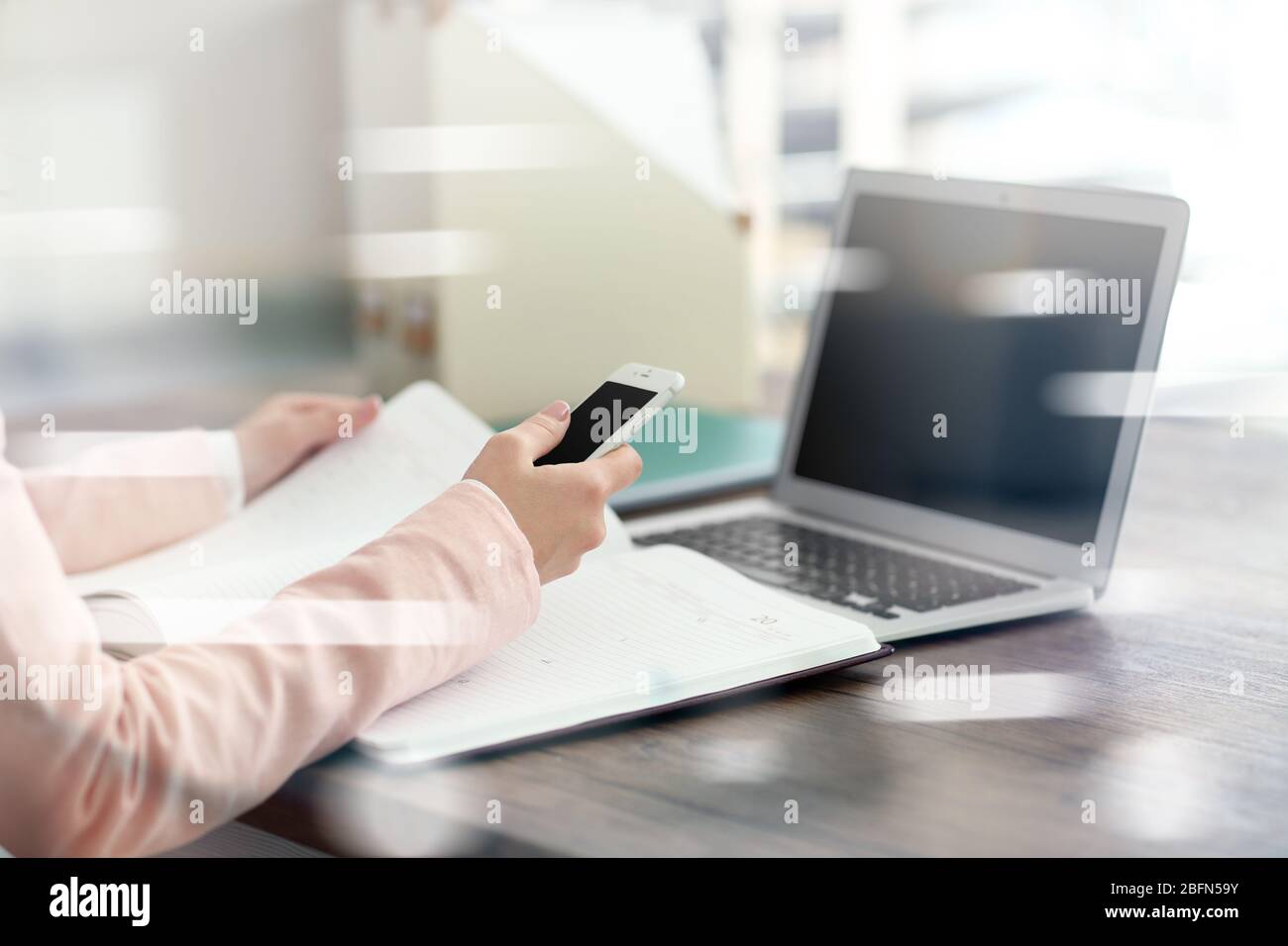 Open space office workplace view through glass with reflection Stock ...