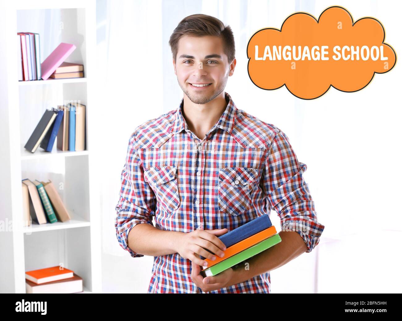 Language school concept with young man Stock Photo - Alamy