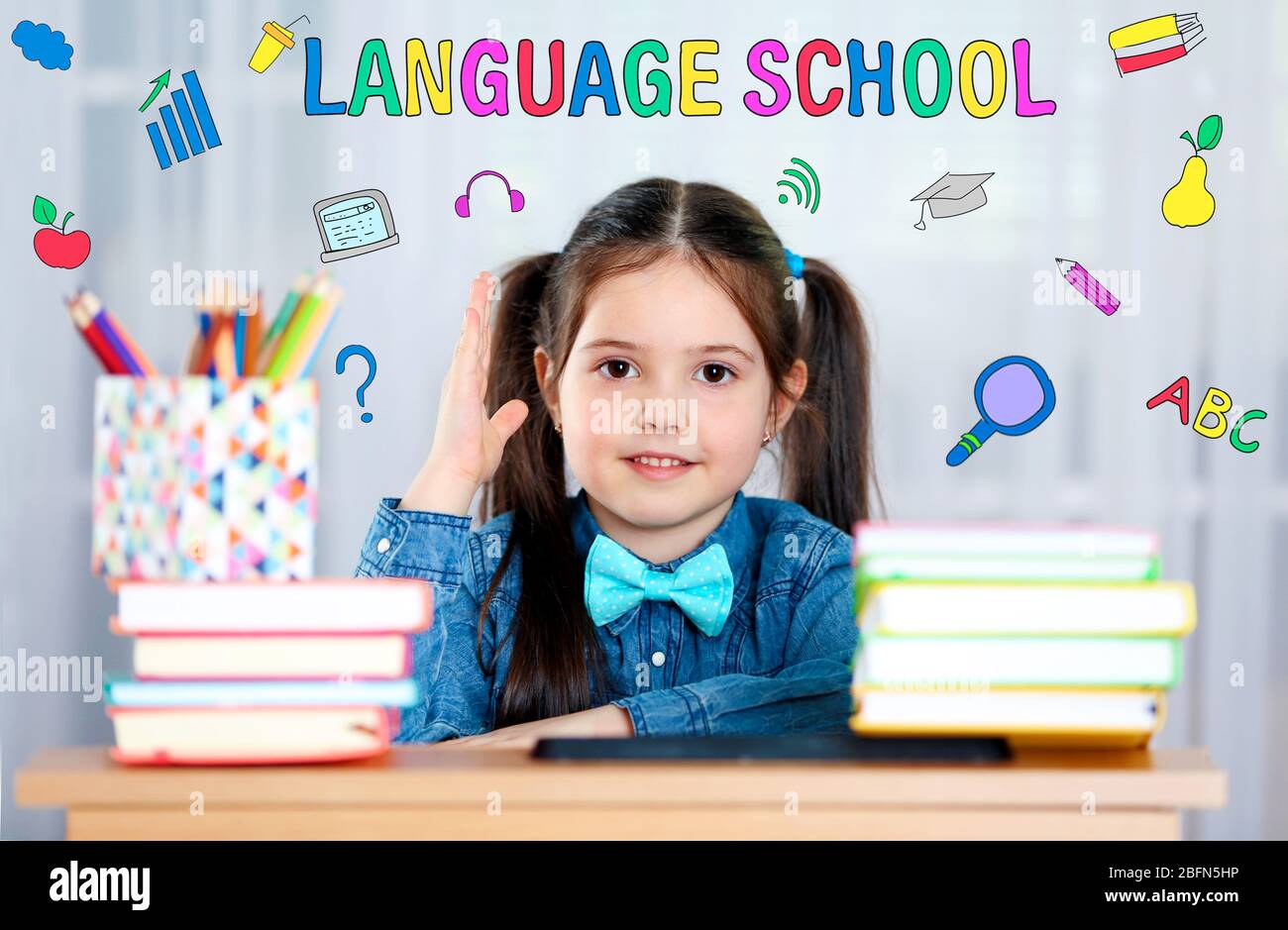 Language school concept with schoolgirl Stock Photo - Alamy