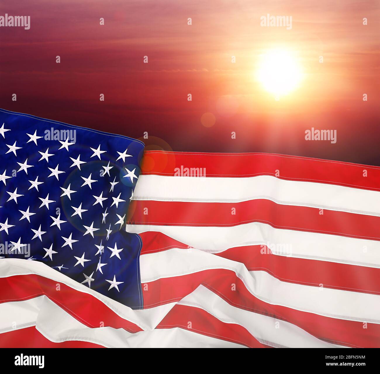 Flag of United States of America on sunset background Stock Photo - Alamy
