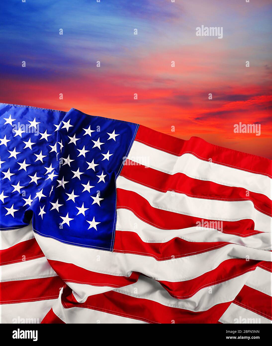 Flag of United States of America on sunset background Stock Photo - Alamy