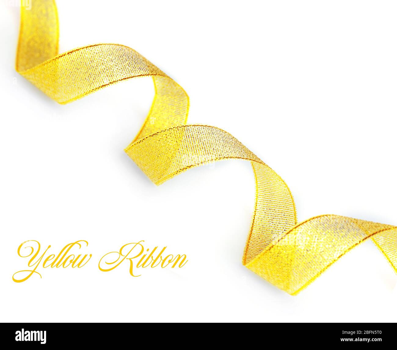 Golden curly ribbon isolated on white Stock Photo - Alamy