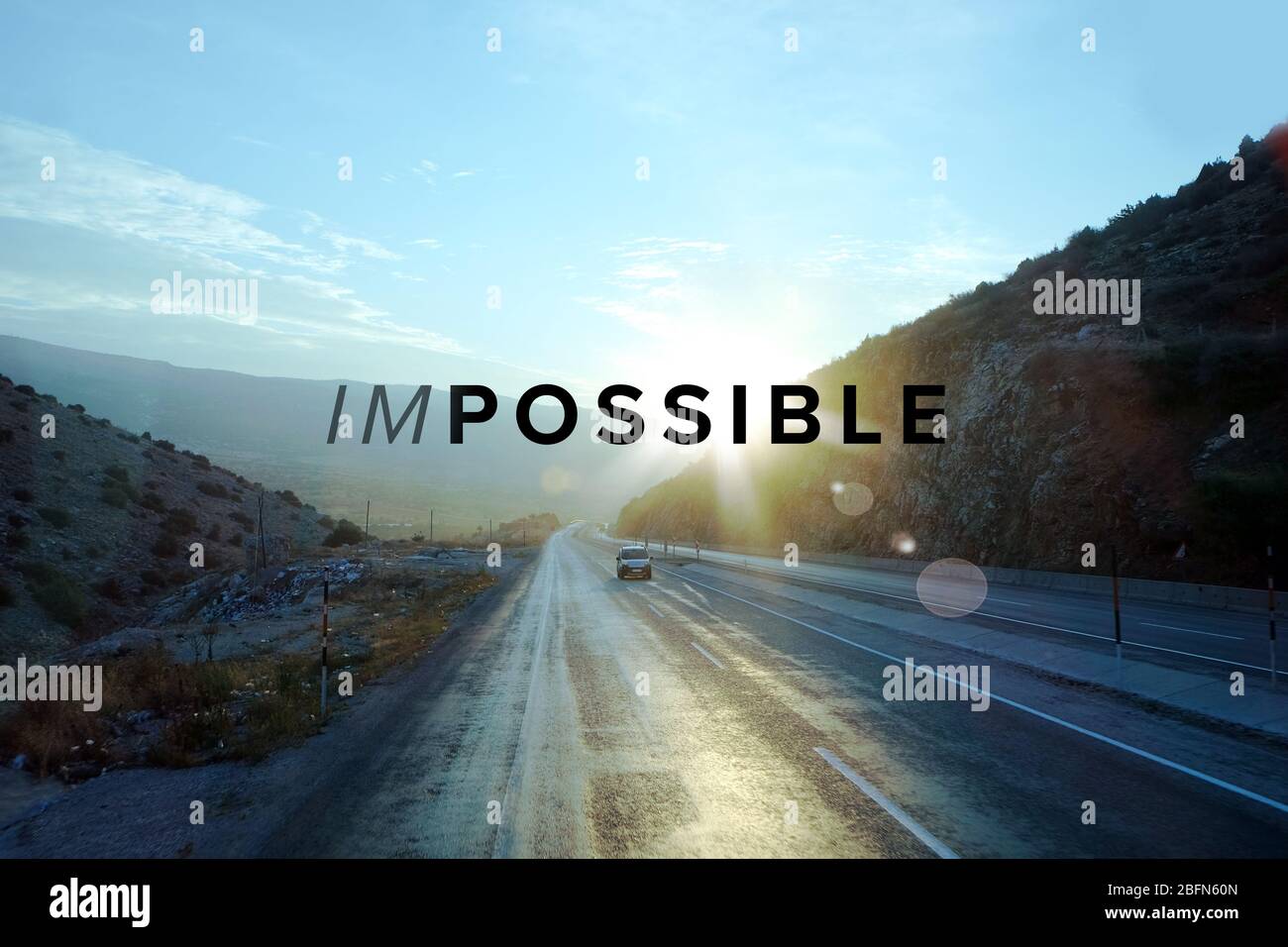 Changing the word impossible to possible on asphalt road Stock Photo ...