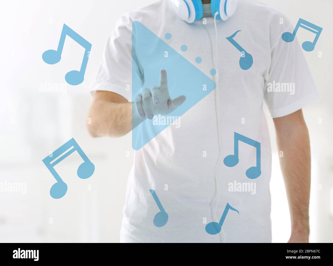 Man push play button on touch screen Stock Photo - Alamy