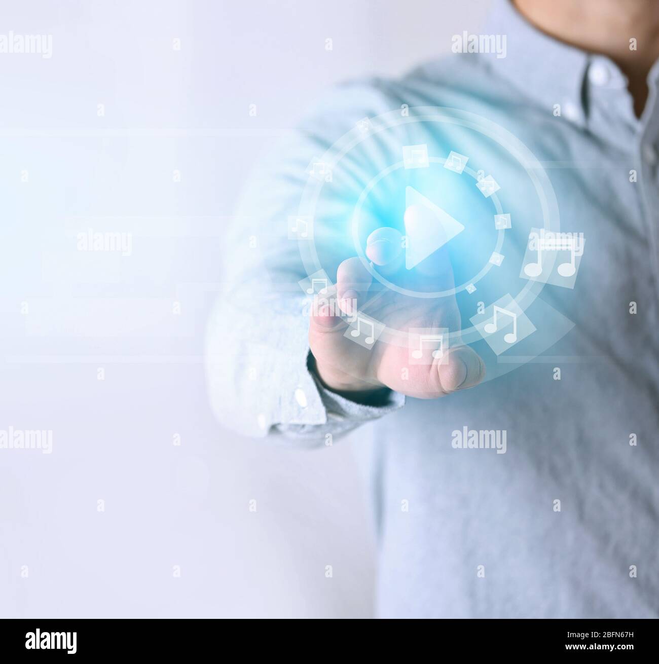 Man push play button on high tech touch screen Stock Photo - Alamy