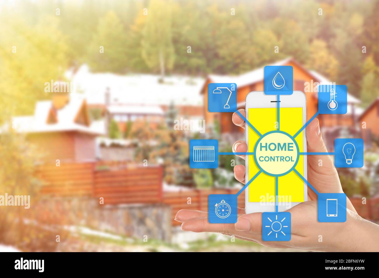 Using smart home app on phone. Smart home control concept Stock Photo ...