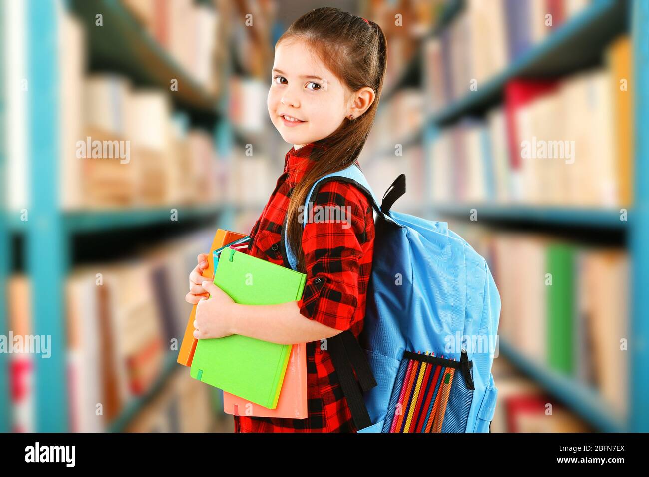 Elementary school girl in bookstore hi-res stock photography and images ...