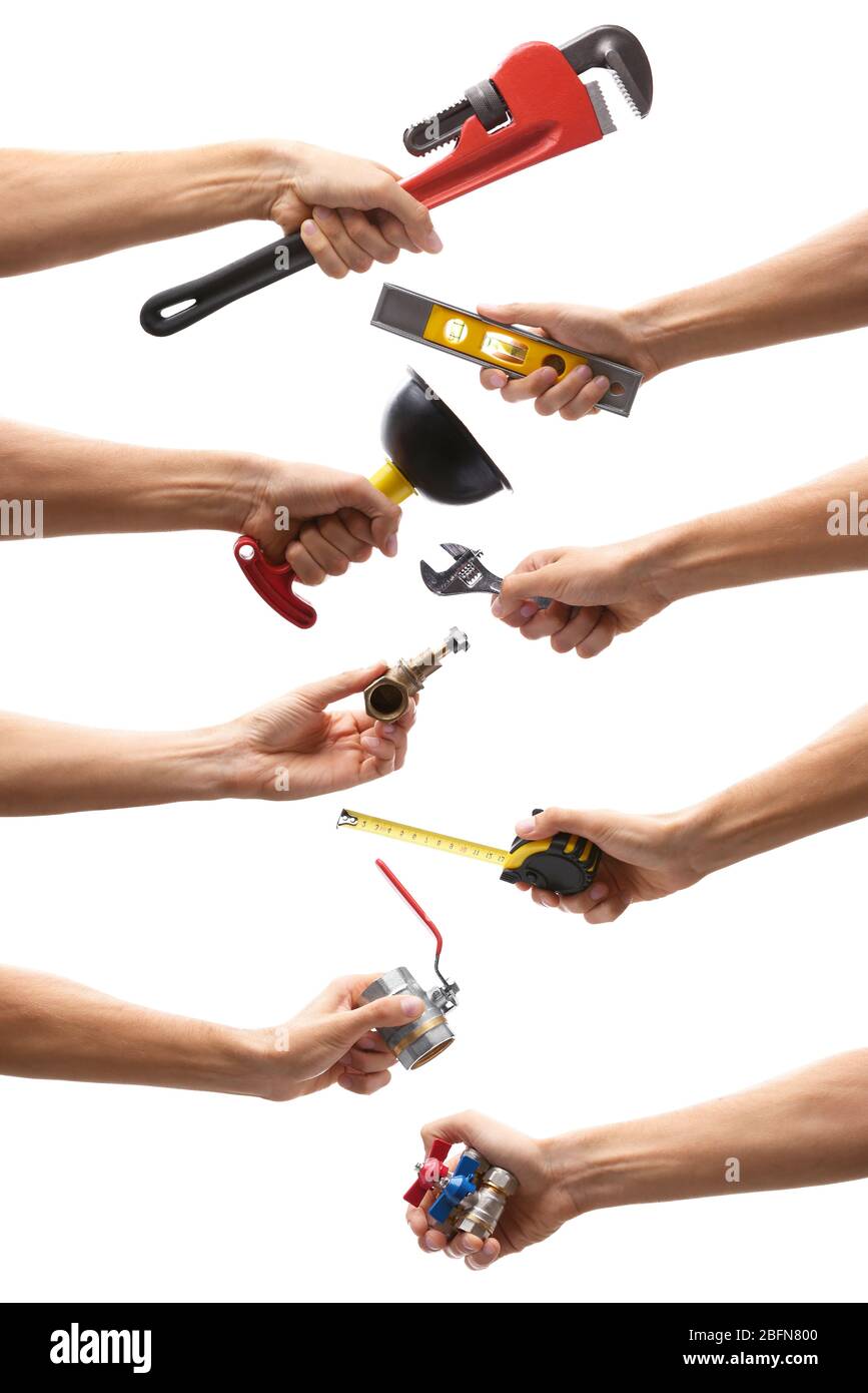 Set of male hands holding plumbing equipment on white background ...