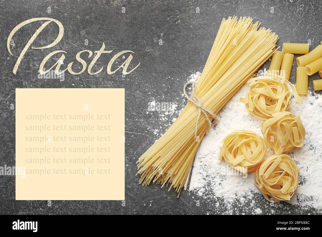 Different pasta with flour on gray table. Italian food concept. Word ...