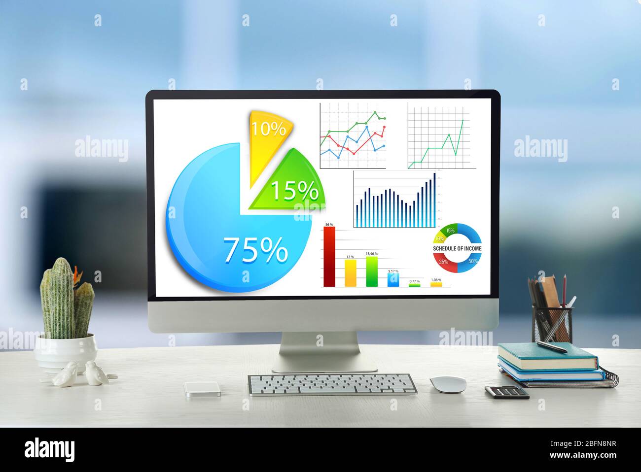 Modern workplace at office. Business presentation on monitor screen ...