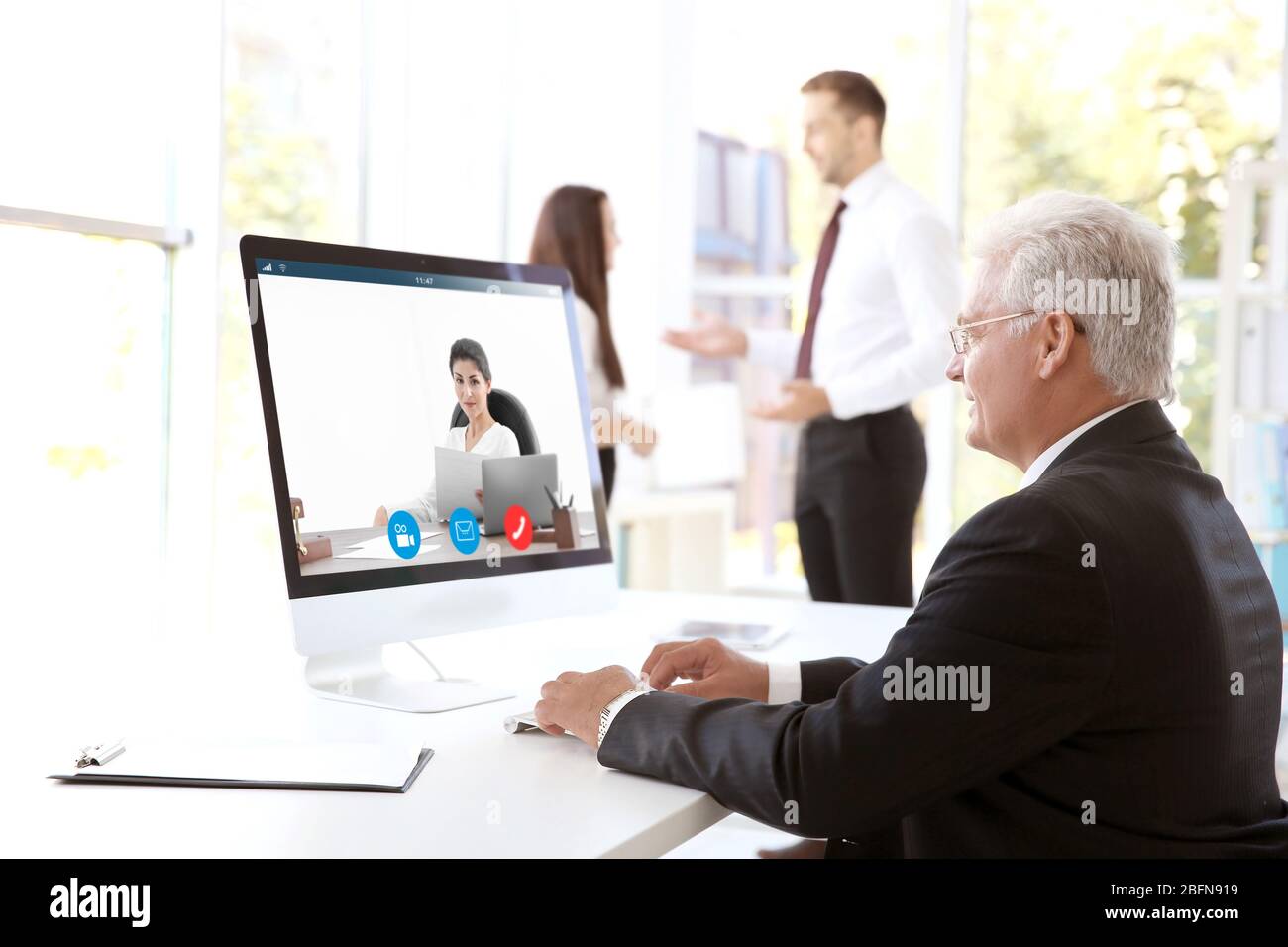 Man video conferencing with lawyer on computer. Video call and online ...