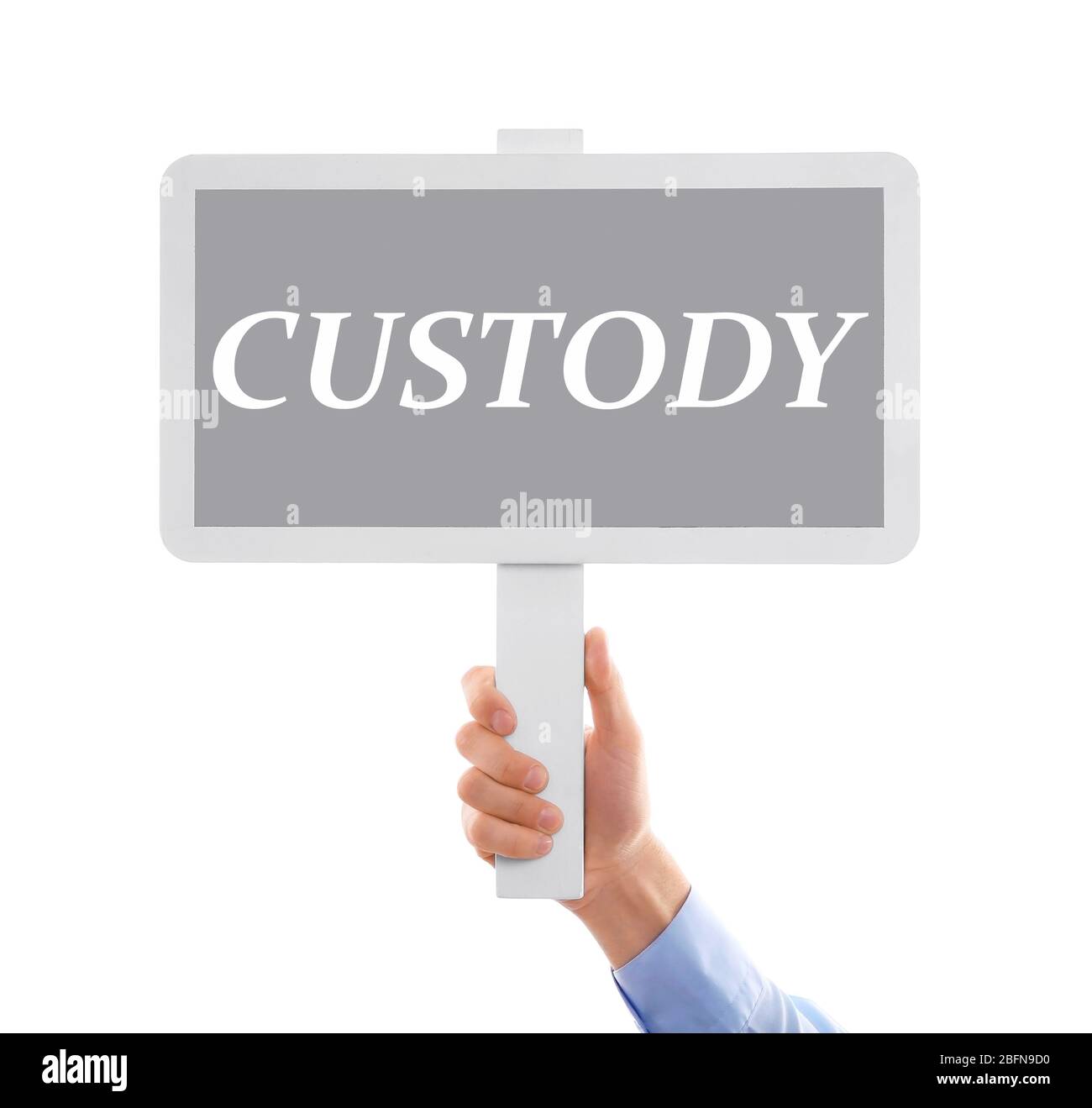 Male hand holding sign board with word CUSTODY on white background ...