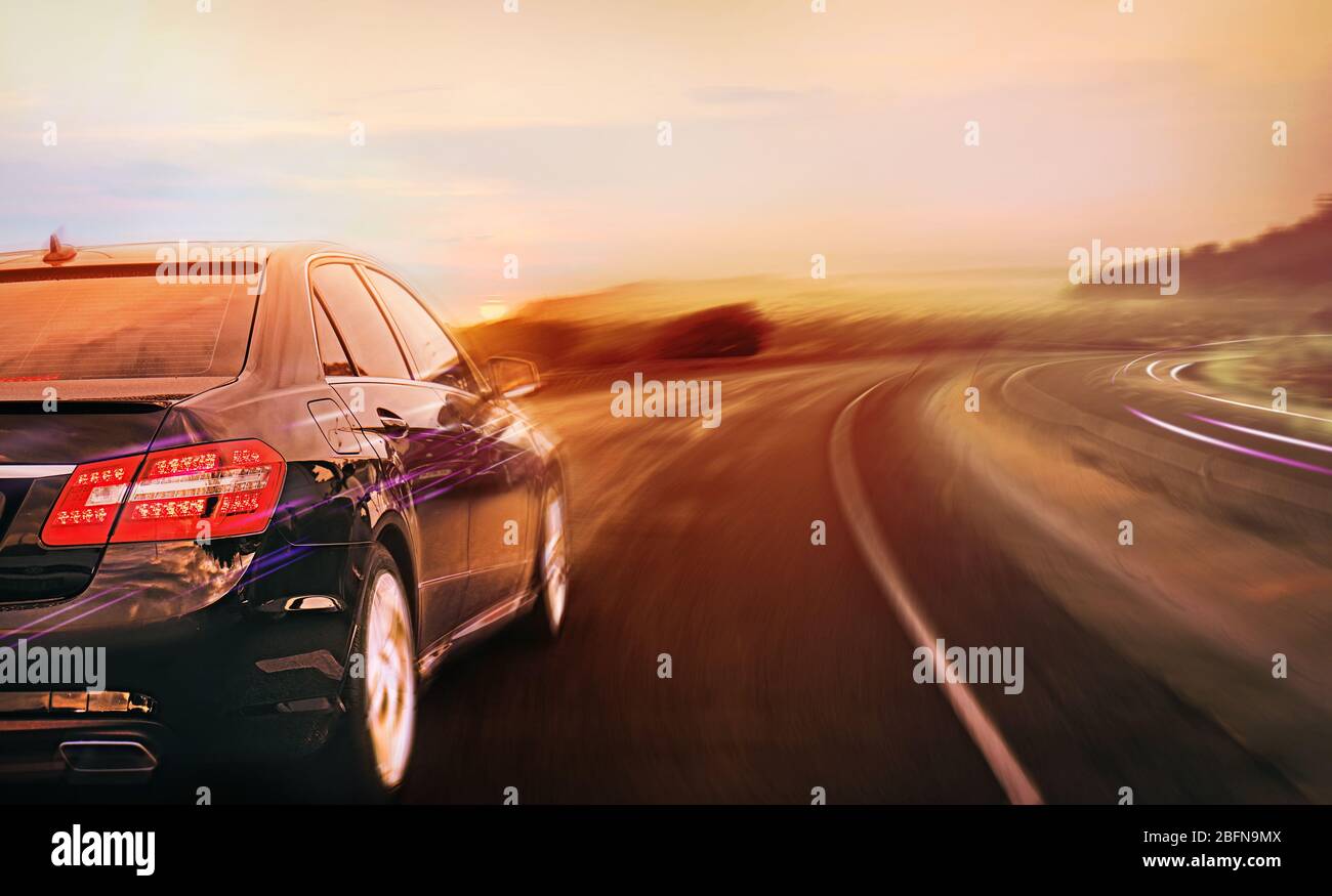 Car driving fast on road, motion effect Stock Photo - Alamy