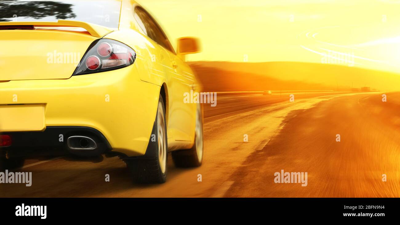 Car driving fast on road, motion effect Stock Photo - Alamy