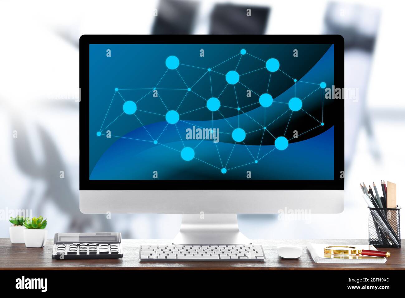 Modern workplace with computer. Network design on screen Stock Photo ...