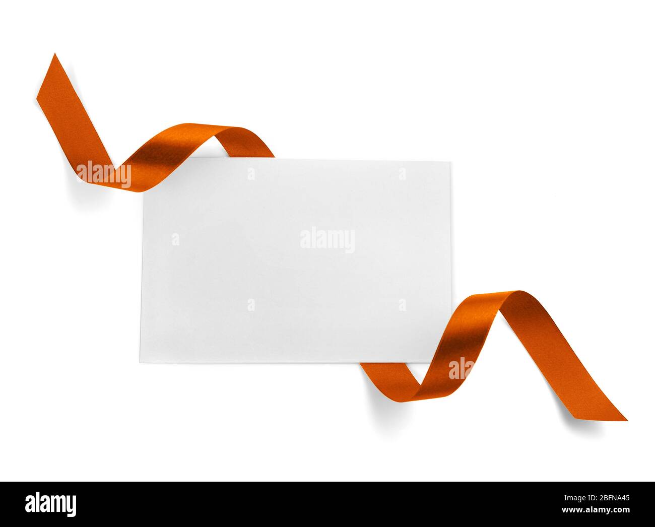Card with festive ribbon on white background Stock Photo - Alamy