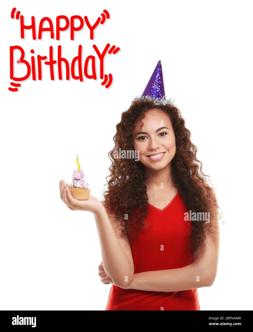 Beautiful African-American girl with birthday cupcake on white ...