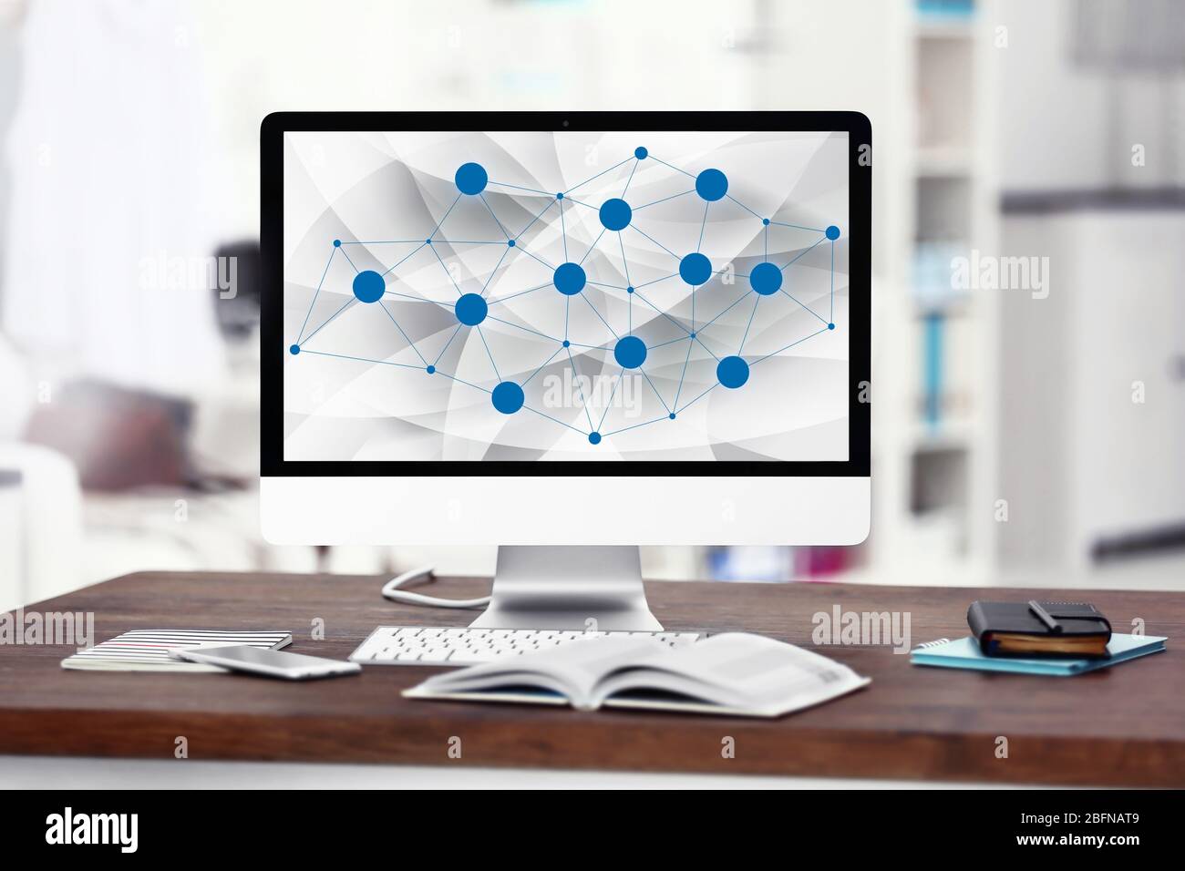 Modern workplace with computer. Network design on screen Stock Photo ...